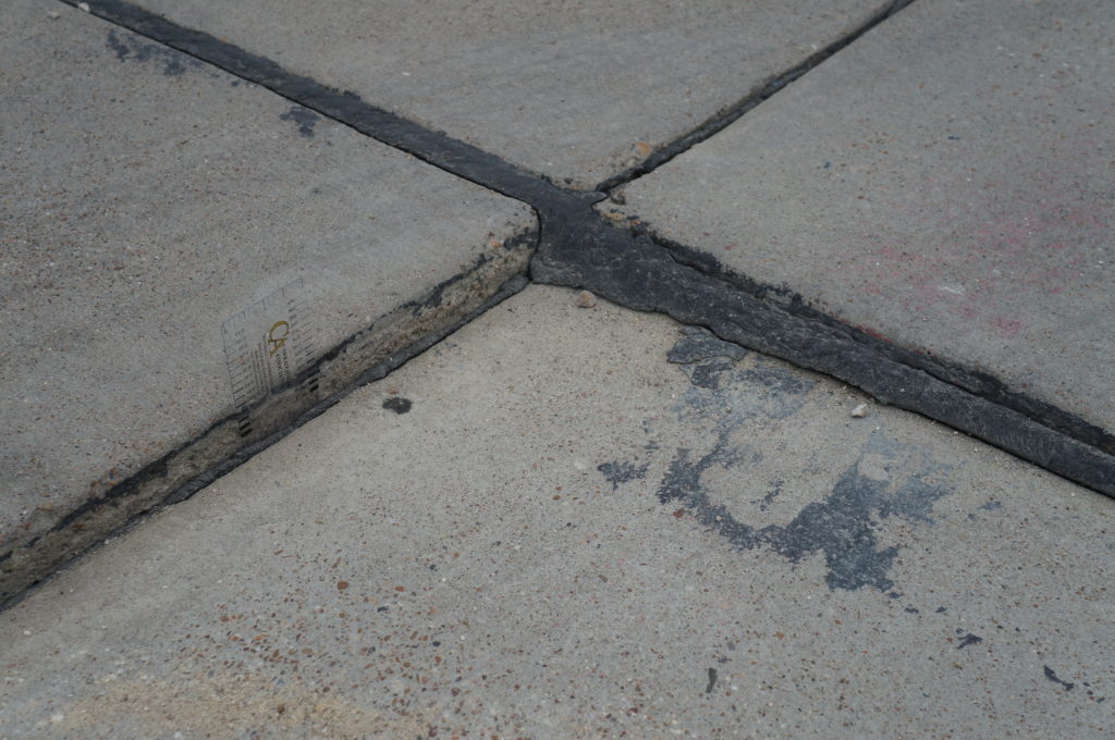 Progressive Distress Mechanism in Industrial Concrete Pavement ...